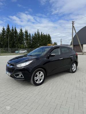 Melns Hyundai ix35 2013 Tauragė, ar dzinēja tilpumu 1.70 L un nobraukumu 248 tūkst. km par 5300 €, foto 3 vietnē AUTOMOTO.COM.LV