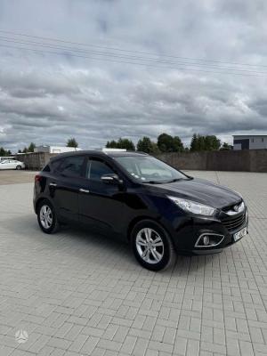 Melns Hyundai ix35 2013 Tauragė, ar dzinēja tilpumu 1.70 L un nobraukumu 248 tūkst. km par 5300 €, foto 4 vietnē AUTOMOTO.COM.LV
