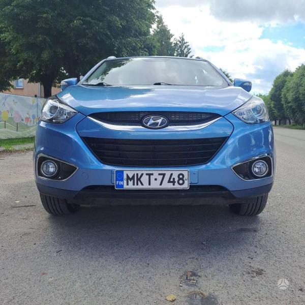 Blue Hyundai ix35 2012 in Kaunas, with an engine capacity of 1.59 L and mileage of 250 thousand km for 4550 €, photo 6 on AUTOMOTO.COM.LV
