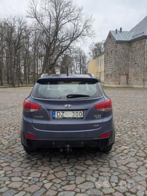 Zils Hyundai ix35 2013 Rīga, ar dzinēja tilpumu 2.00 L un nobraukumu 278 tūkst. km par 3600 €, foto 6 vietnē AUTOMOTO.COM.LV