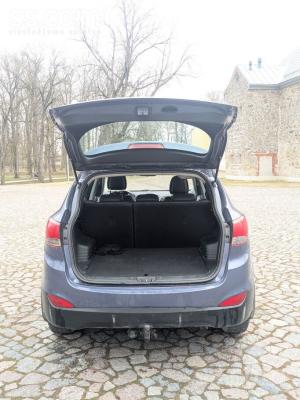 Zils Hyundai ix35 2013 Rīga, ar dzinēja tilpumu 2.00 L un nobraukumu 278 tūkst. km par 3600 €, foto 8 vietnē AUTOMOTO.COM.LV