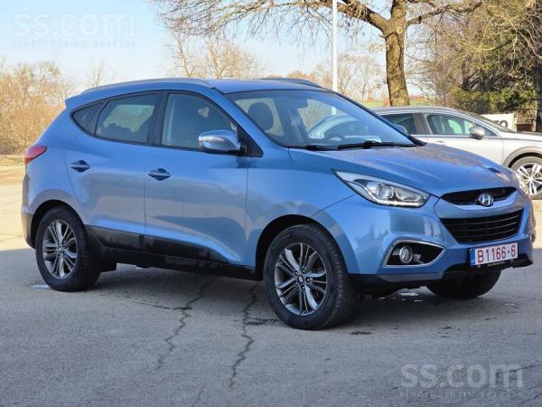 Zils Hyundai ix35 2015 Liepāja, ar dzinēja tilpumu 2.00 L un nobraukumu 306 tūkst. km par 7450 €, foto 5 vietnē AUTOMOTO.COM.LV