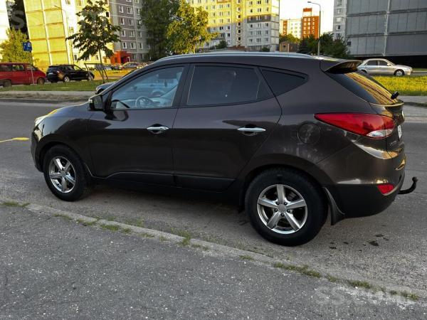 Brūns Hyundai ix35 2011 Rīga, ar dzinēja tilpumu 2.00 L un nobraukumu 180 tūkst. km par 7150 €, foto 5 vietnē AUTOMOTO.COM.LV