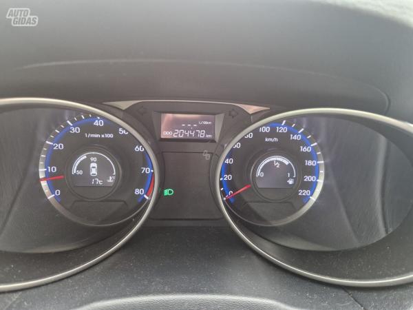 Brown Hyundai ix35 2011 in Palanga, with an engine capacity of 2.00 L and mileage of 205 thousand km for 6150 €, photo 1 on AUTOMOTO.COM.LV