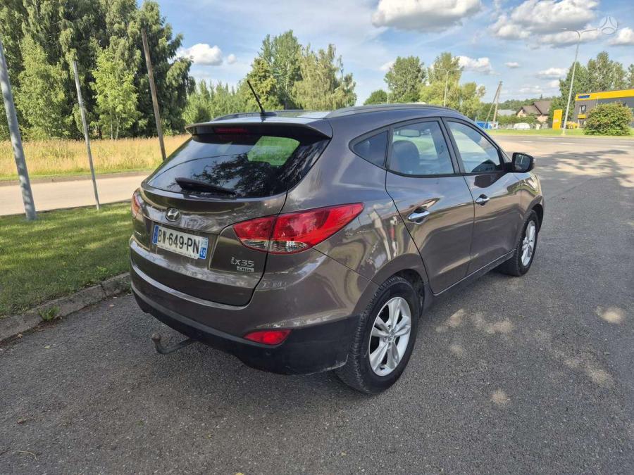 Brūns Hyundai ix35 2011 Tauragė, ar dzinēja tilpumu 2.00 L un nobraukumu 221 tūkst. km par 5200 €, foto 5 vietnē AUTOMOTO.COM.LV