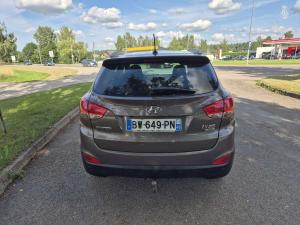 Brūns Hyundai ix35 2011 Tauragė, ar dzinēja tilpumu 2.00 L un nobraukumu 221 tūkst. km par 5200 €, foto 6 vietnē AUTOMOTO.COM.LV