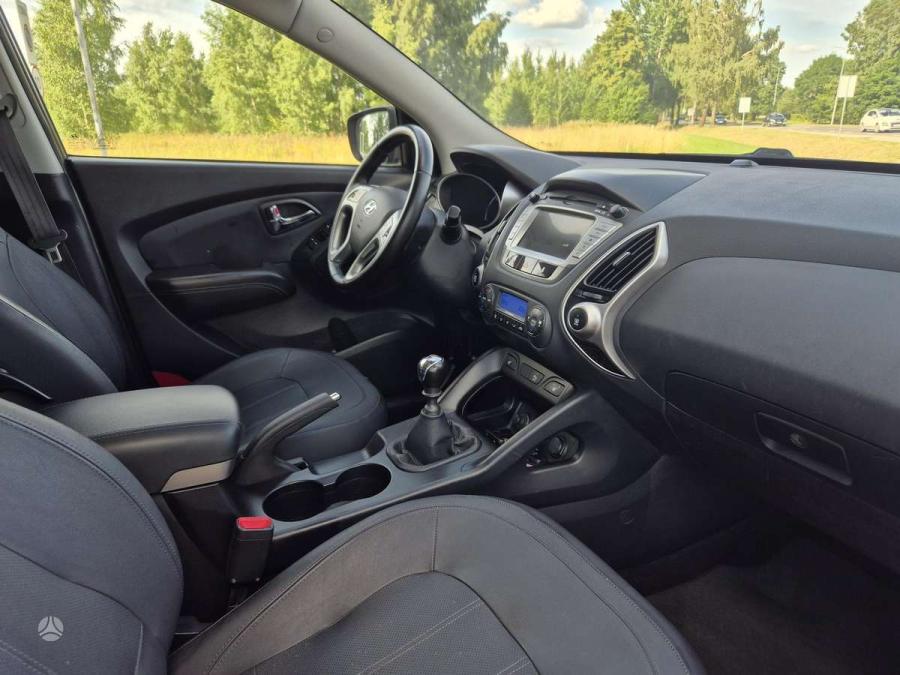 Brūns Hyundai ix35 2011 Tauragė, ar dzinēja tilpumu 2.00 L un nobraukumu 221 tūkst. km par 5200 €, foto 8 vietnē AUTOMOTO.COM.LV