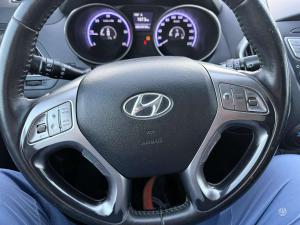 Brown Hyundai ix35 2011 in Taurage, with an engine capacity of 2.00 L and mileage of 248 thousand km for 5200 €, photo 15 on AUTOMOTO.COM.LV