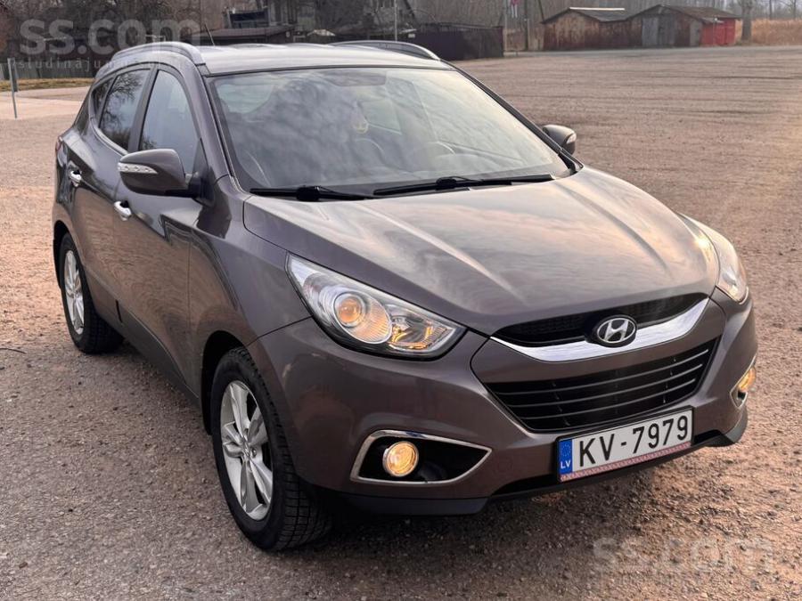 Brown Hyundai ix35 2012 in Riga, with an engine capacity of 2.00 L and mileage of 147 thousand km for 7250 €, photo 7 on AUTOMOTO.COM.LV