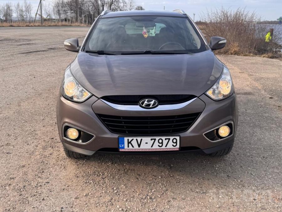 Brown Hyundai ix35 2012 in Riga, with an engine capacity of 2.00 L and mileage of 147 thousand km for 7250 €, photo 13 on AUTOMOTO.COM.LV