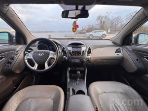 Brown Hyundai ix35 2012 in Riga, with an engine capacity of 2.00 L and mileage of 147 thousand km for 7250 €, photo 14 on AUTOMOTO.COM.LV
