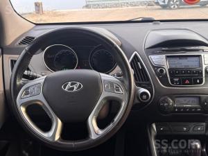 Brown Hyundai ix35 2012 in Riga, with an engine capacity of 2.00 L and mileage of 147 thousand km for 7250 €, photo 15 on AUTOMOTO.COM.LV