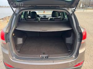 Brown Hyundai ix35 2012 in Riga, with an engine capacity of 2.00 L and mileage of 147 thousand km for 7250 €, photo 16 on AUTOMOTO.COM.LV