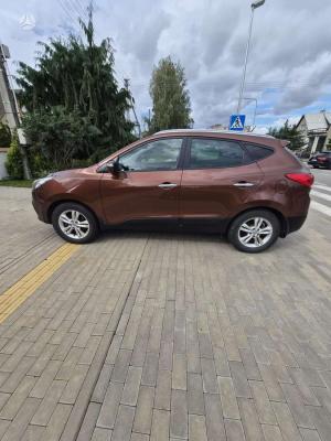 Brūns Hyundai ix35 2012 Marijampole, ar dzinēja tilpumu 2.00 L un nobraukumu 112 tūkst. km par 6200 €, foto 6 vietnē AUTOMOTO.COM.LV