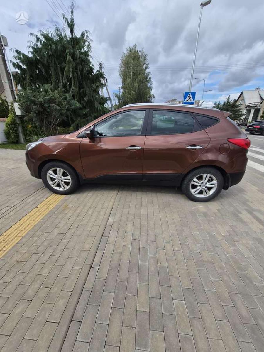 Brūns Hyundai ix35 2012 Marijampole, ar dzinēja tilpumu 2.00 L un nobraukumu 112 tūkst. km par 6200 €, foto 6 vietnē AUTOMOTO.COM.LV
