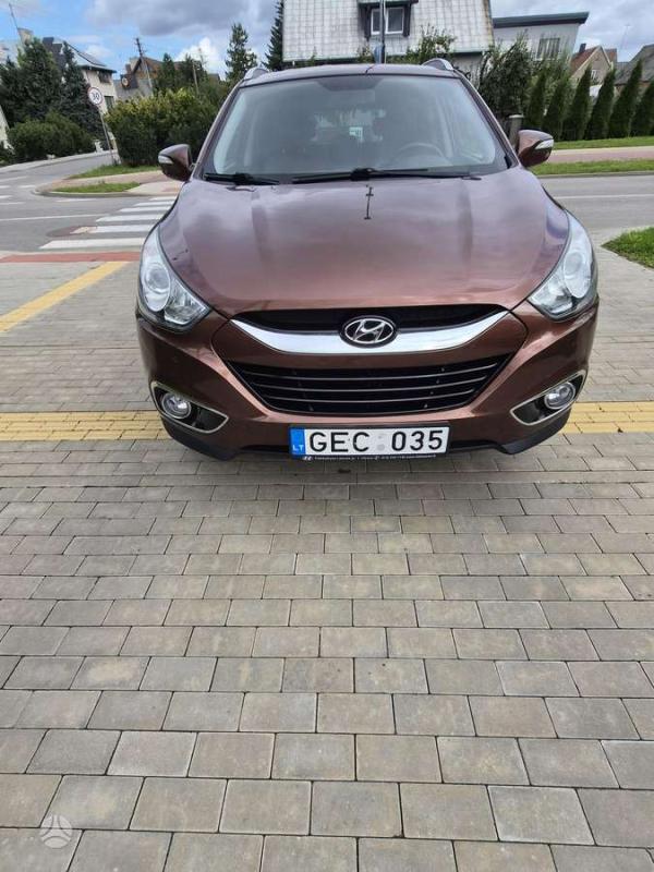 Brown Hyundai ix35 2012 in Marijampole, with an engine capacity of 2.00 L and mileage of 112 thousand km for 6200 €, photo 10 on AUTOMOTO.COM.LV