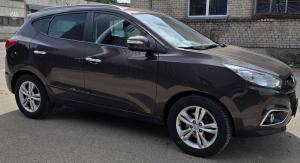 Brown Hyundai ix35 2013 in Rokiskis, with an engine capacity of 2.00 L and mileage of 237 thousand km for 5400 €, photo 5 on AUTOMOTO.COM.LV