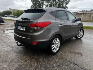 Brown Hyundai ix35 2013 in Siauliai, with an engine capacity of 2.00 L and mileage of 283 thousand km for 5900 €, photo 6 on AUTOMOTO.COM.LV