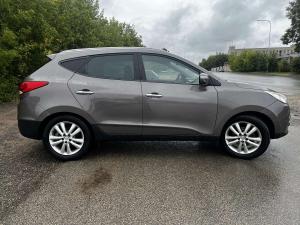 Brown Hyundai ix35 2013 in Siauliai, with an engine capacity of 2.00 L and mileage of 283 thousand km for 5900 €, photo 7 on AUTOMOTO.COM.LV