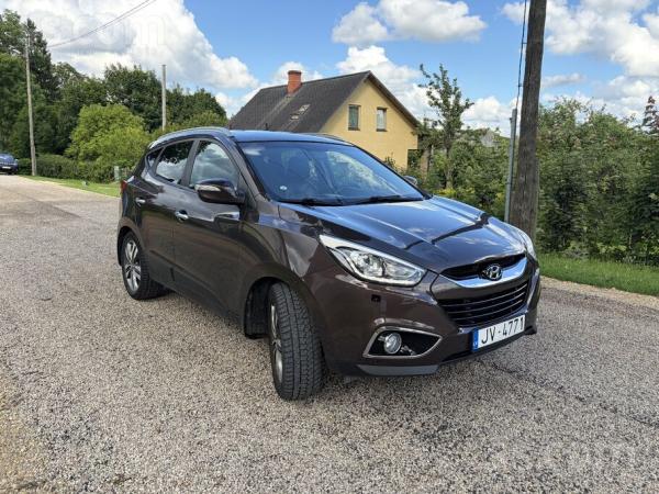 Brown Hyundai ix35 2015 in Rezekne, with an engine capacity of 2.00 L and mileage of 283 thousand km for 7300 €, photo 7 on AUTOMOTO.COM.LV