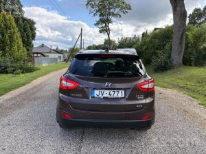 Brūns Hyundai ix35 2015 Rēzekne, ar dzinēja tilpumu 2.00 L un nobraukumu 283 tūkst. km par 7300 €, foto 5 vietnē AUTOMOTO.COM.LV