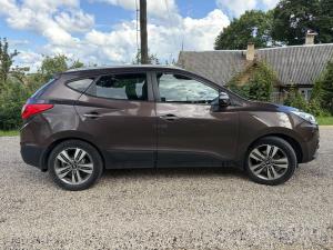 Brūns Hyundai ix35 2015 Rēzekne, ar dzinēja tilpumu 2.00 L un nobraukumu 283 tūkst. km par 7300 €, foto 7 vietnē AUTOMOTO.COM.LV