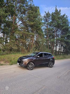 Brown Hyundai ix35 2015 in Vilnius, with an engine capacity of 2.00 L and mileage of 218 thousand km for 5999 €, photo  on AUTOMOTO.COM.LV