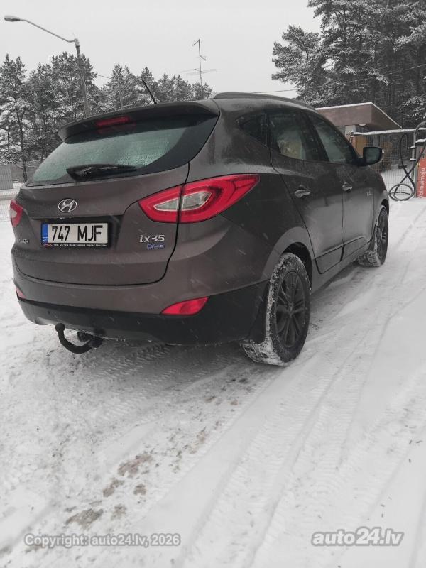 Brown Hyundai ix35 2013 in Tallinn, with an engine capacity of 1.60 L and mileage of 176 thousand km for 6950 €, photo 4 on AUTOMOTO.COM.LV