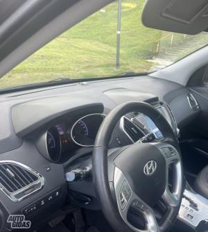 Hyundai ix35 2010 in Kaunas, with an engine capacity of 2.00 L and mileage of 275 thousand km for 6500 €, photo 19 on AUTOMOTO.COM.LV