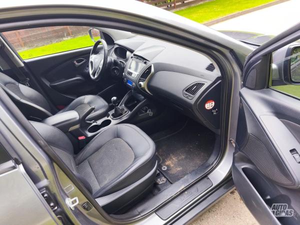 Hyundai ix35 2012 in Kaunas, with an engine capacity of 1.60 L and mileage of 246 thousand km for 2000 €, photo 7 on AUTOMOTO.COM.LV