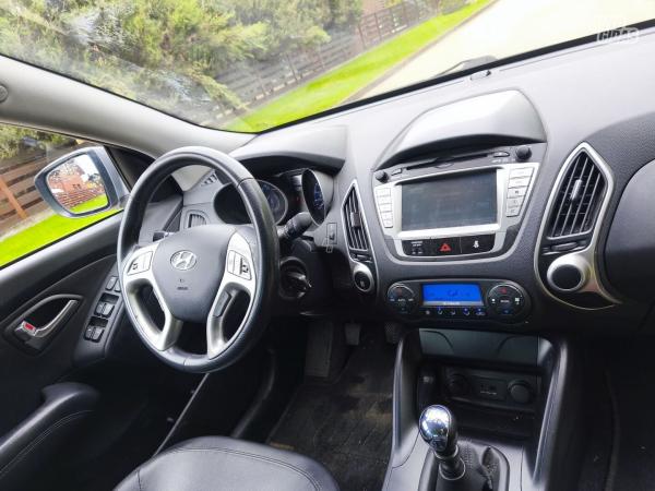 Hyundai ix35 2012 in Kaunas, with an engine capacity of 1.60 L and mileage of 246 thousand km for 2000 €, photo 8 on AUTOMOTO.COM.LV