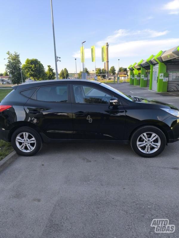 Hyundai ix35 2013 in Ukmerge, with an engine capacity of 1.70 L and mileage of 258 thousand km for 6250 €, photo 3 on AUTOMOTO.COM.LV