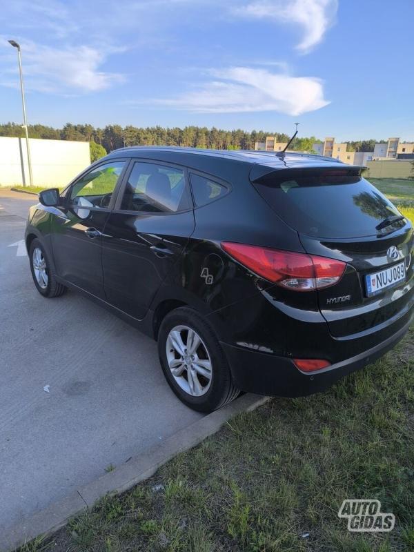 Hyundai ix35 2013 in Ukmerge, with an engine capacity of 1.70 L and mileage of 258 thousand km for 6250 €, photo 5 on AUTOMOTO.COM.LV