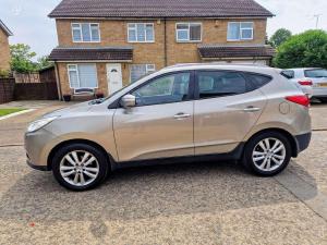 Grey Hyundai ix35 2010 in Siauliai, with an engine capacity of 2.00 L and mileage of 155 thousand km for 2299 €, photo 6 on AUTOMOTO.COM.LV
