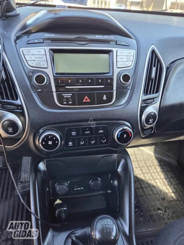 Pelēks Hyundai ix35 2010 Panevēža, ar dzinēja tilpumu 2.00 L un nobraukumu 296 tūkst. km par 5000 €, foto 9 vietnē AUTOMOTO.COM.LV