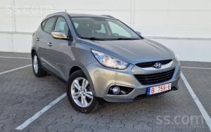 Grey Hyundai ix35 2010 in Riga, with an engine capacity of 2.00 L and mileage of 255 thousand km for 5995 €, photo 7 on AUTOMOTO.COM.LV