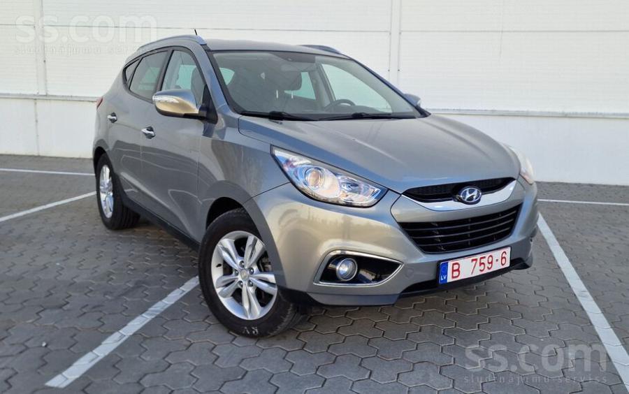 Grey Hyundai ix35 2010 in Riga, with an engine capacity of 2.00 L and mileage of 255 thousand km for 5995 €, photo 7 on AUTOMOTO.COM.LV