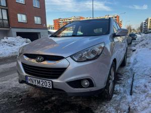 Grey Hyundai ix35 2011 in Vilnius, with an engine capacity of 2.00 L and mileage of 226 thousand km for 4650 €, photo 8 on AUTOMOTO.COM.LV
