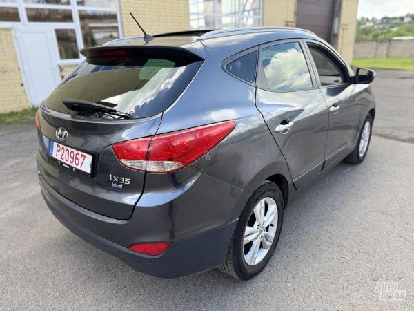 Grey Hyundai ix35 2011 in Kaunas, with an engine capacity of 1.70 L and mileage of 246 thousand km for 4750 €, photo 7 on AUTOMOTO.COM.LV