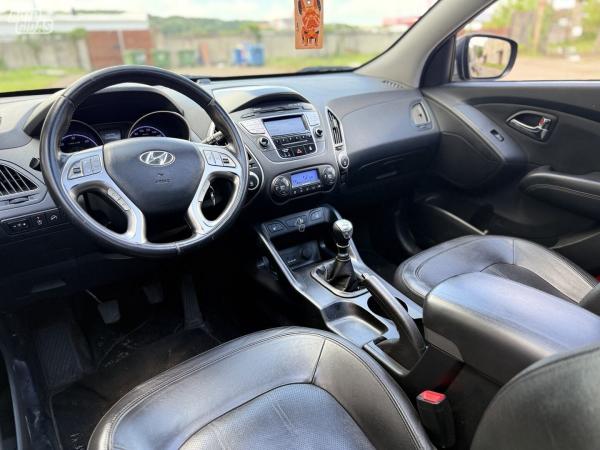 Grey Hyundai ix35 2011 in Kaunas, with an engine capacity of 1.70 L and mileage of 246 thousand km for 4750 €, photo 9 on AUTOMOTO.COM.LV