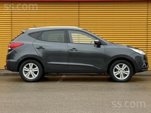 Grey Hyundai ix35 2011 in Ogre, with an engine capacity of 2.00 L and mileage of 149 thousand km for 6997 €, photo 8 on AUTOMOTO.COM.LV