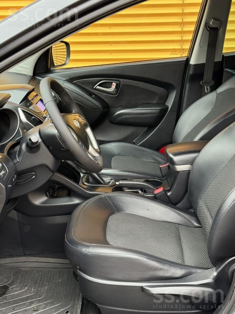 Grey Hyundai ix35 2011 in Ogre, with an engine capacity of 2.00 L and mileage of 149 thousand km for 6997 €, photo 11 on AUTOMOTO.COM.LV
