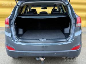 Grey Hyundai ix35 2011 in Ogre, with an engine capacity of 2.00 L and mileage of 149 thousand km for 6997 €, photo 13 on AUTOMOTO.COM.LV