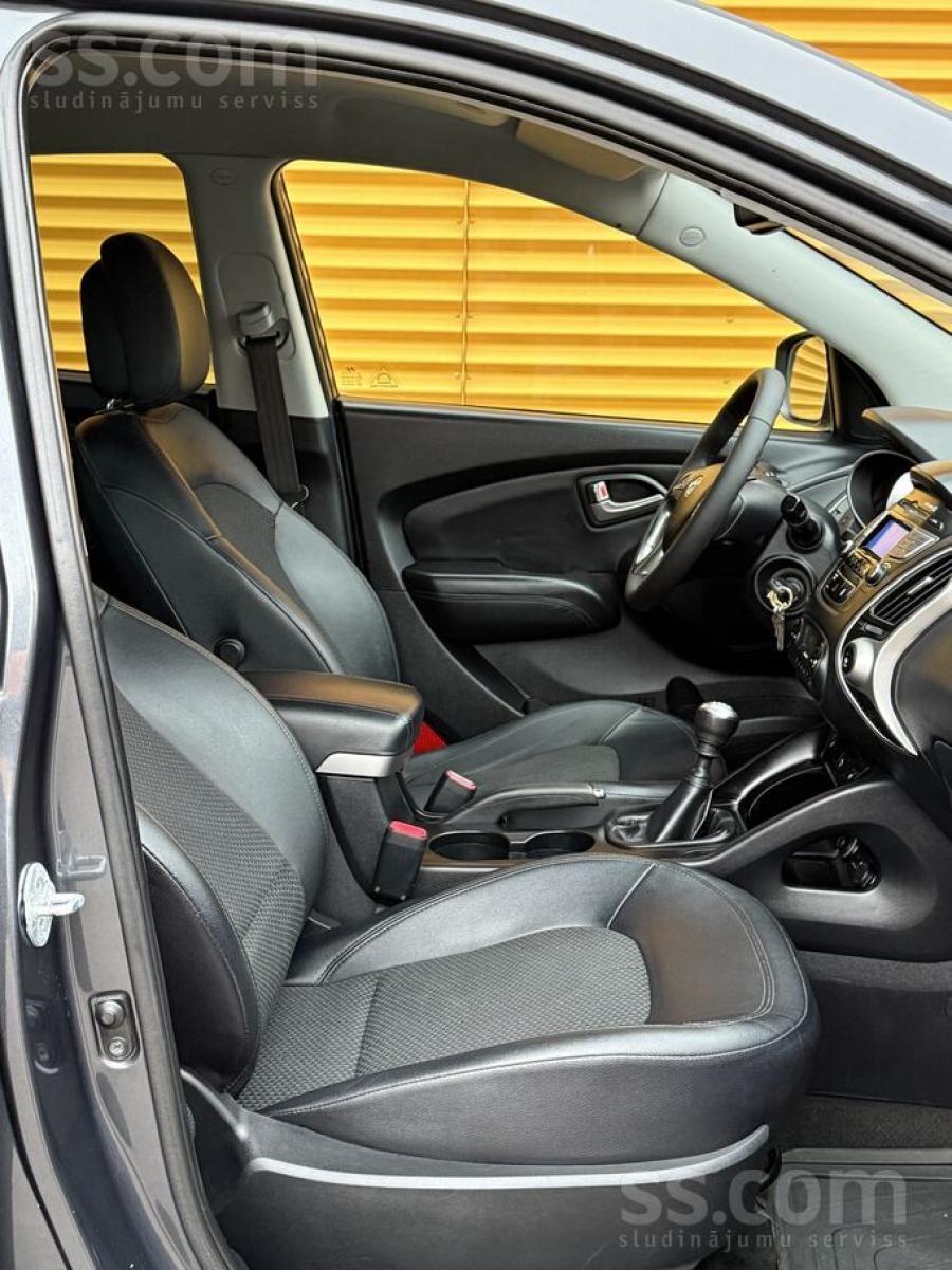 Grey Hyundai ix35 2011 in Ogre, with an engine capacity of 2.00 L and mileage of 149 thousand km for 6997 €, photo 16 on AUTOMOTO.COM.LV