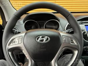 Grey Hyundai ix35 2011 in Ogre, with an engine capacity of 2.00 L and mileage of 149 thousand km for 6997 €, photo 19 on AUTOMOTO.COM.LV