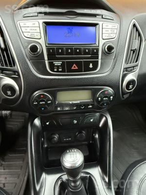 Grey Hyundai ix35 2011 in Ogre, with an engine capacity of 2.00 L and mileage of 149 thousand km for 6997 €, photo 20 on AUTOMOTO.COM.LV