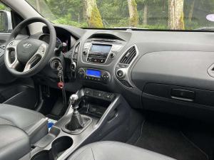 Grey Hyundai ix35 2011 in Taurage, with an engine capacity of 1.59 L and mileage of 230 thousand km for 4450 €, photo 11 on AUTOMOTO.COM.LV