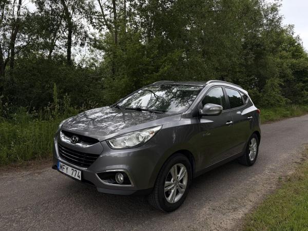 Grey Hyundai ix35 2012 in Alytus, with an engine capacity of 1.60 L and mileage of 246 thousand km for 3900 €, photo 6 on AUTOMOTO.COM.LV
