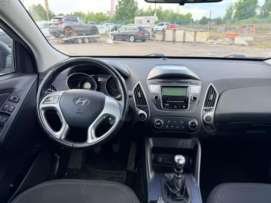 Grey Hyundai ix35 2012 in Panevezys, with an engine capacity of 1.70 L and mileage of 188 thousand km for 3250 €, photo 13 on AUTOMOTO.COM.LV