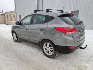 Grey Hyundai ix35 2013 in Ukmerge, with an engine capacity of 1.69 L and mileage of 230 thousand km for 5900 €, photo 5 on AUTOMOTO.COM.LV